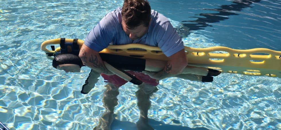 Train Lifeguards with Realistic Spinal Injury Simulations